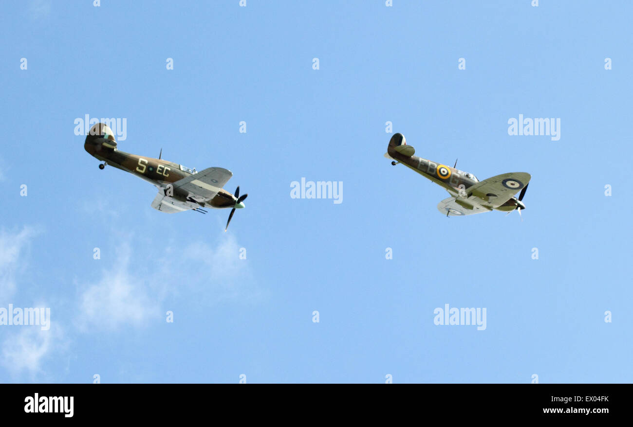 A Hurricane (L) and Spitfire (R) perform a fly past at Chatsworth ...
