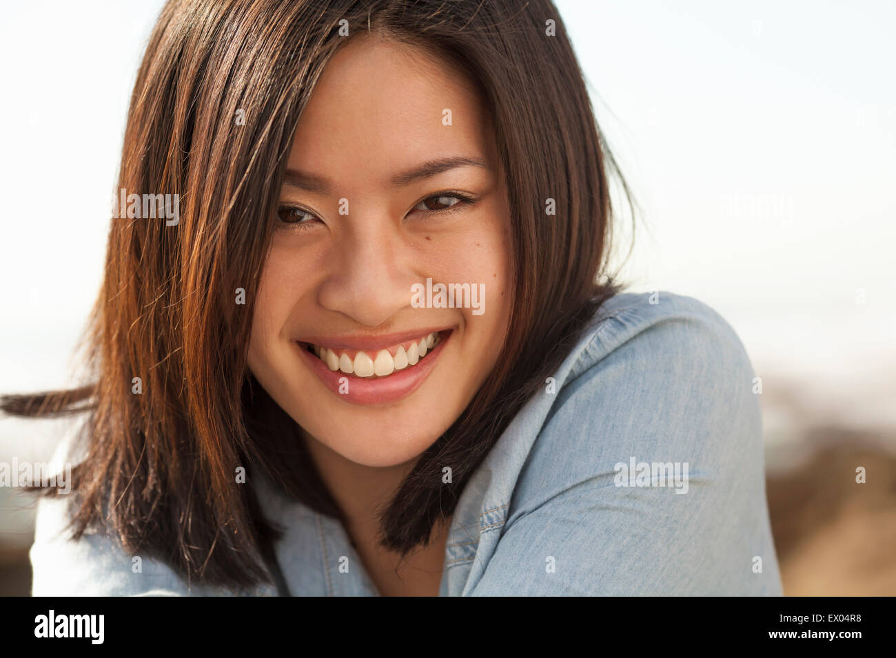 Smiling brunette fun outdoors hi-res stock photography and images - Alamy