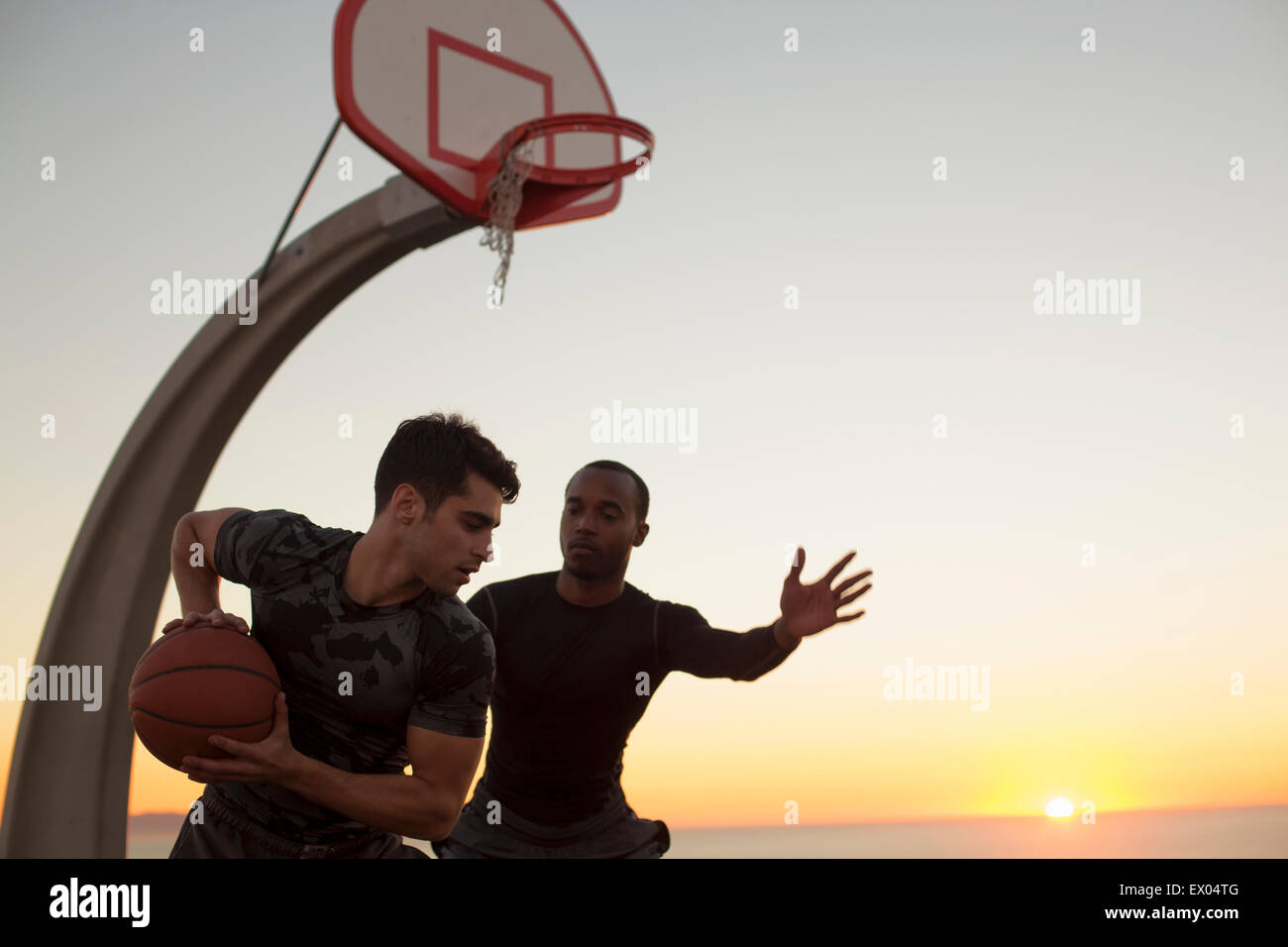 Young men playing basketball, outdoors Stock Photo - Alamy Young men playing basketball, outdoors Stock Photo - Alamy