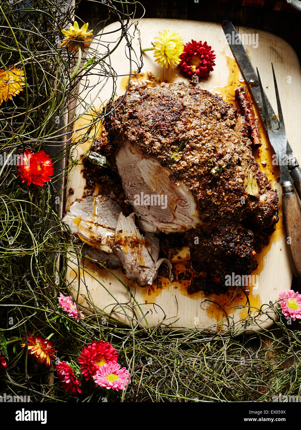 Still life with North Indian dry spiced lamb leg Stock Photo - Alamy