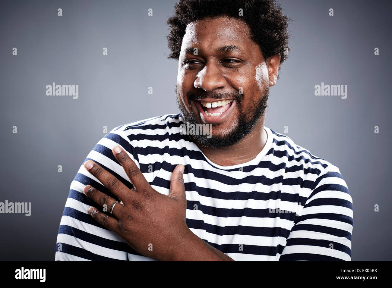 Laughing studio hi-res stock photography and images - Alamy