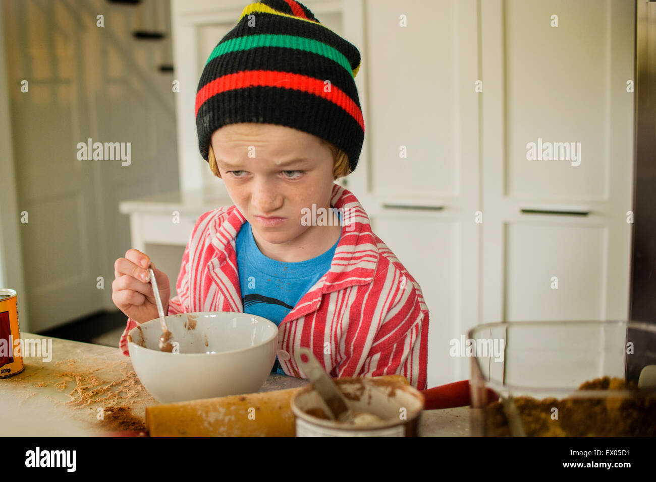 Child pulling face sulking hi-res stock photography and images - Alamy