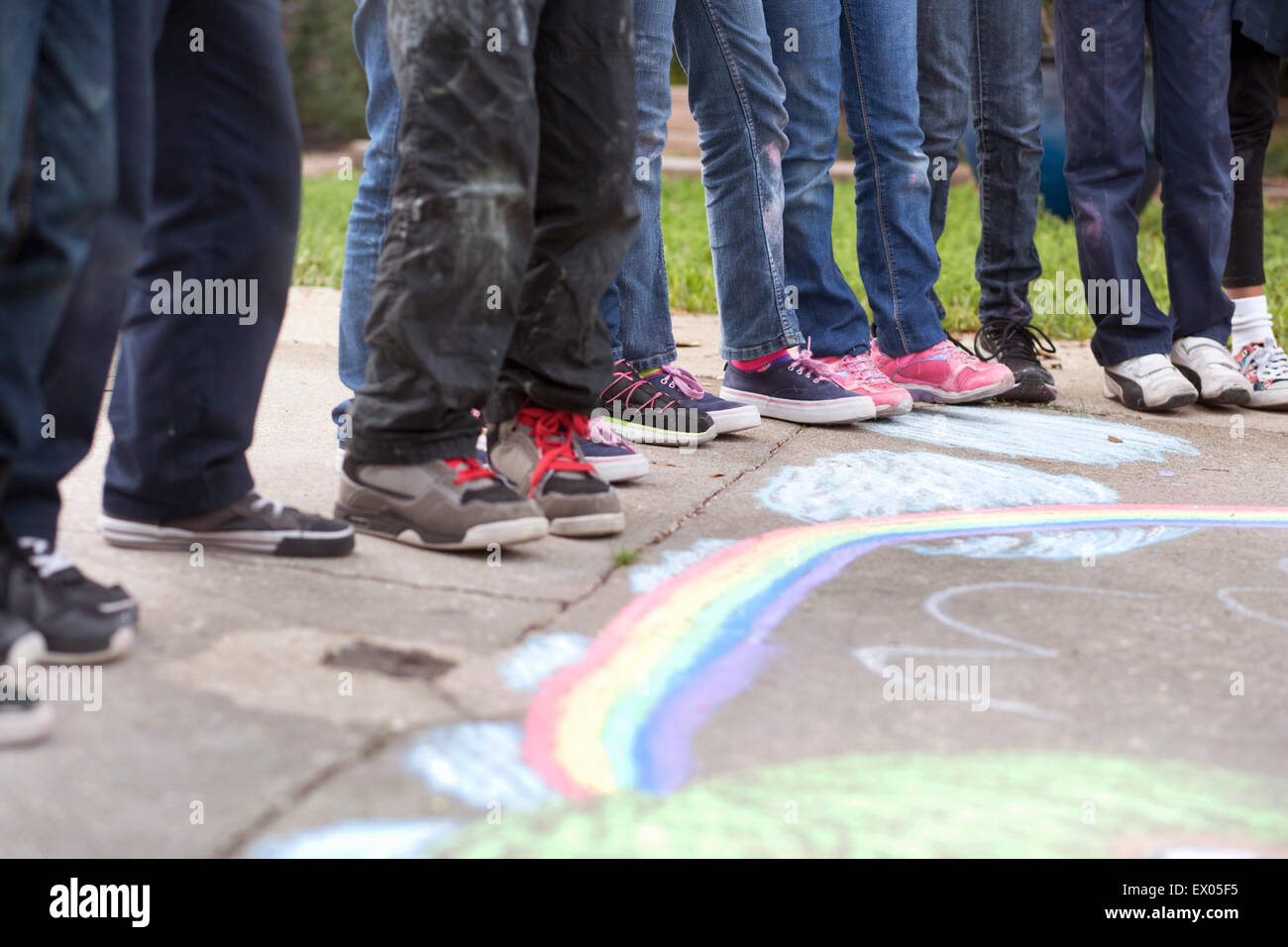 Children standing in a row outdoors Stock Photo - Alamy