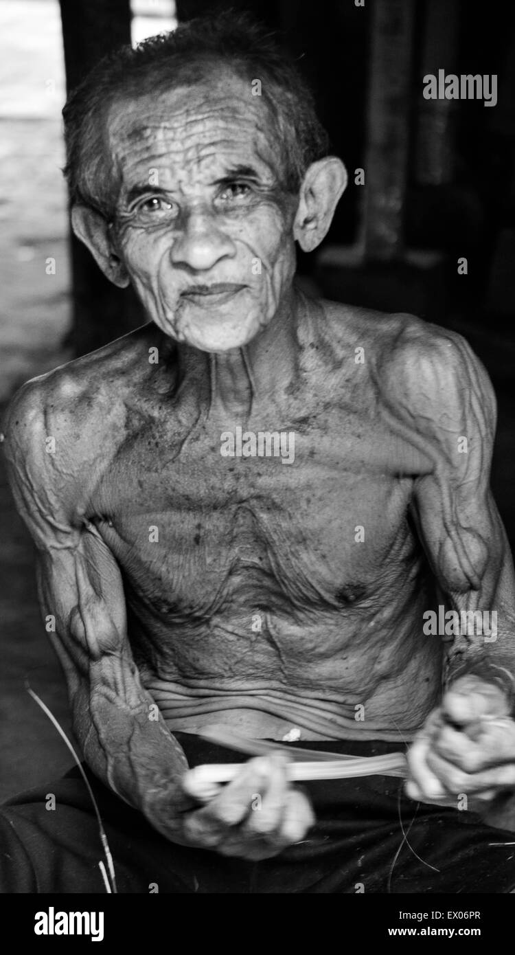 Old Balinese Man in small village Stock Photo - Alamy
