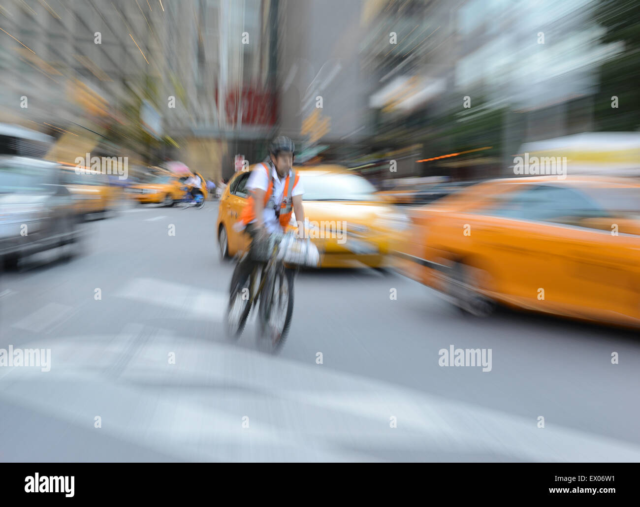 Purposely Blurred taxi cabs and vehicles in traffic showing fast motion ...