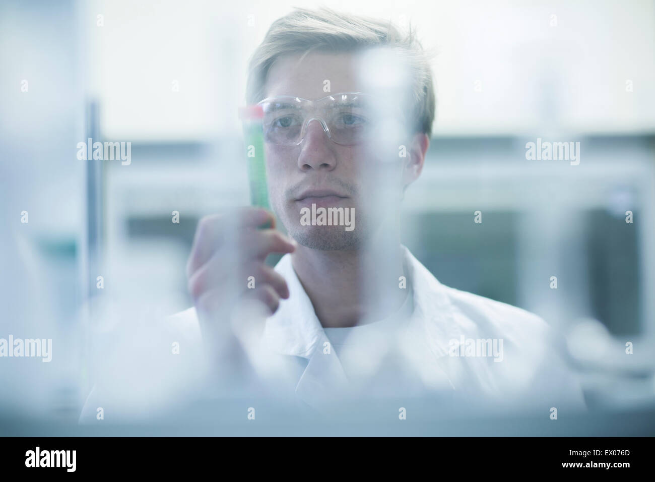 Analyzing scrutinizing hi-res stock photography and images - Alamy