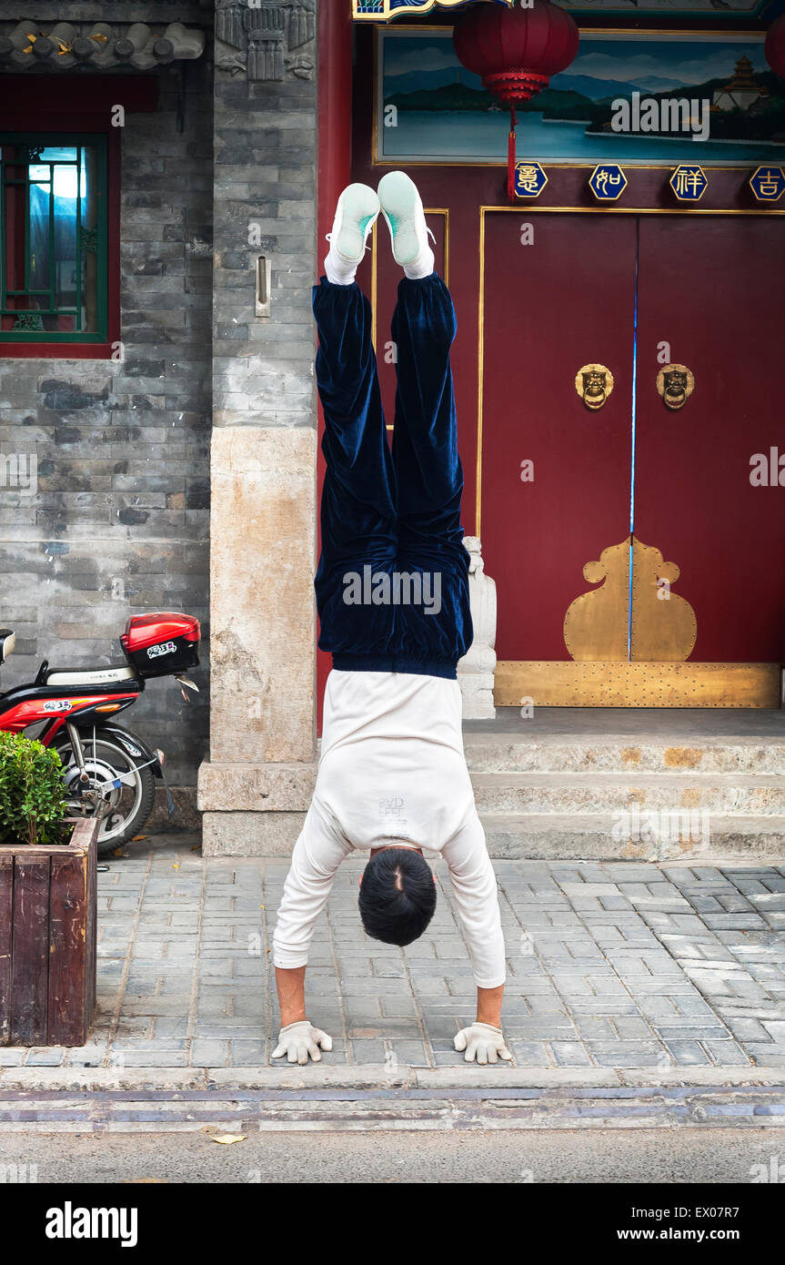 Man doing a handstand hi-res stock photography and images - Alamy