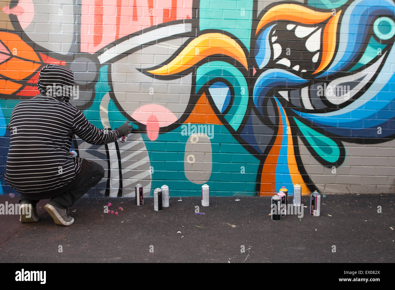 Graffiti Street Artists Paint a mural in Australia Stock Photo - Alamy