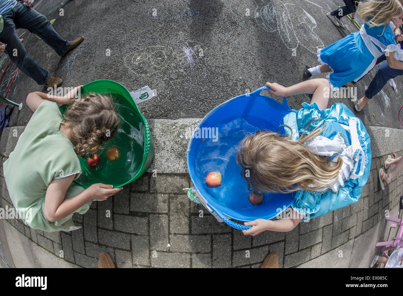 The traditional game of Apple bobbing at a London street party Stock ...