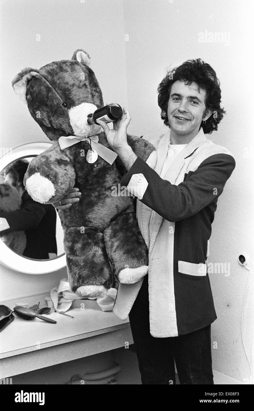 Singer and Actor David Essex poses with a teddy bear sent to him by a ...