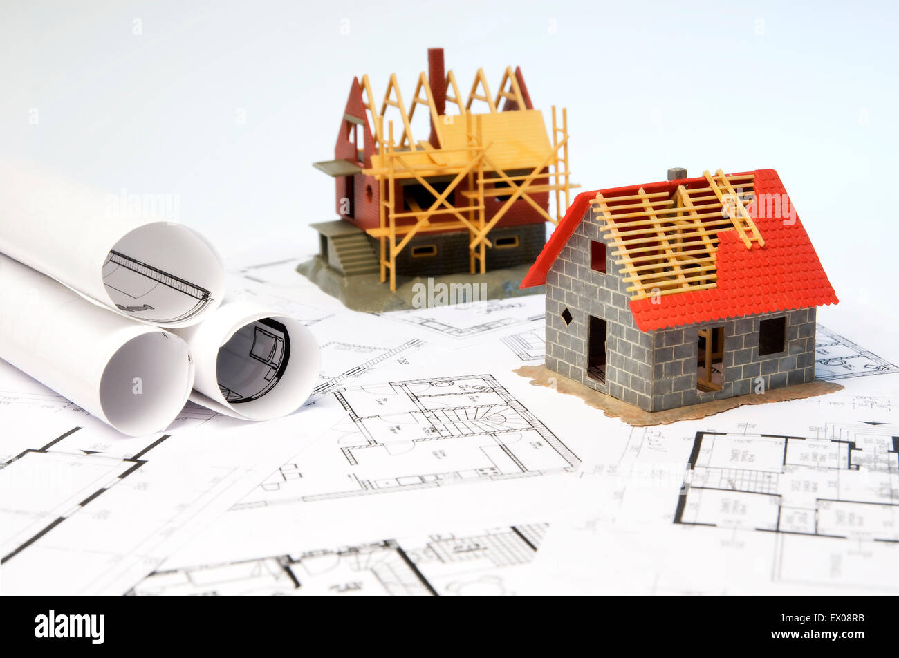 Blueprints and shell of houses Stock Photo - Alamy