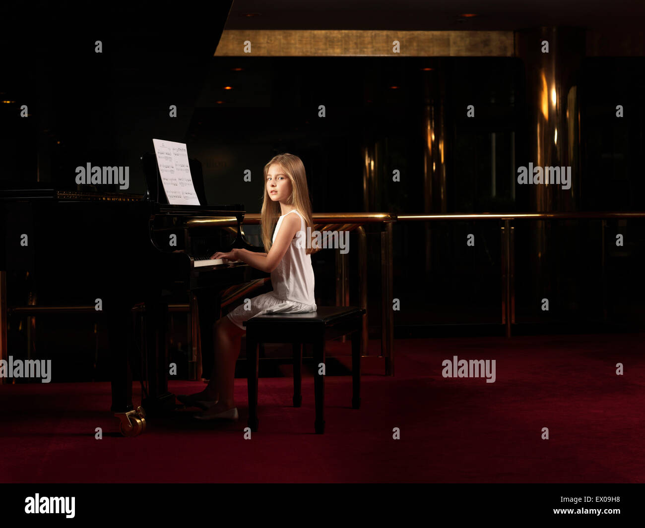 Girl Playing Piano Side View Stock Photos & Girl Playing Piano Side ...