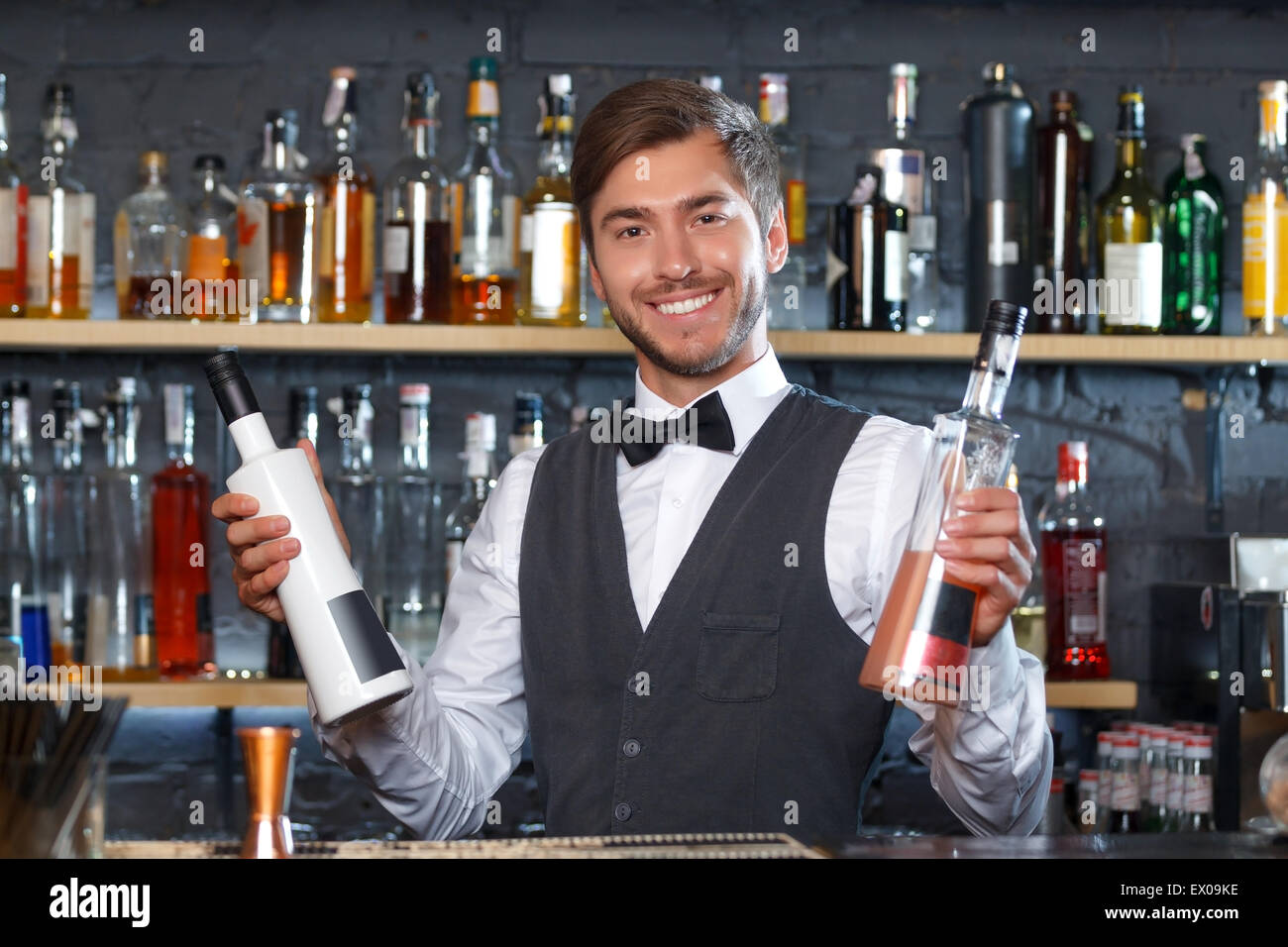 Bartender working nightclub pouring wine hi-res stock photography and ...