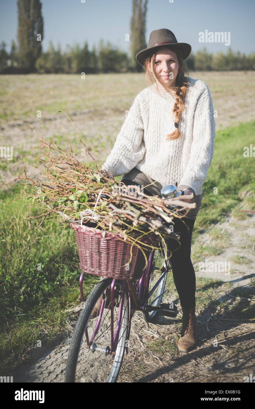 Women carrying sticks hi-res stock photography and images - Alamy