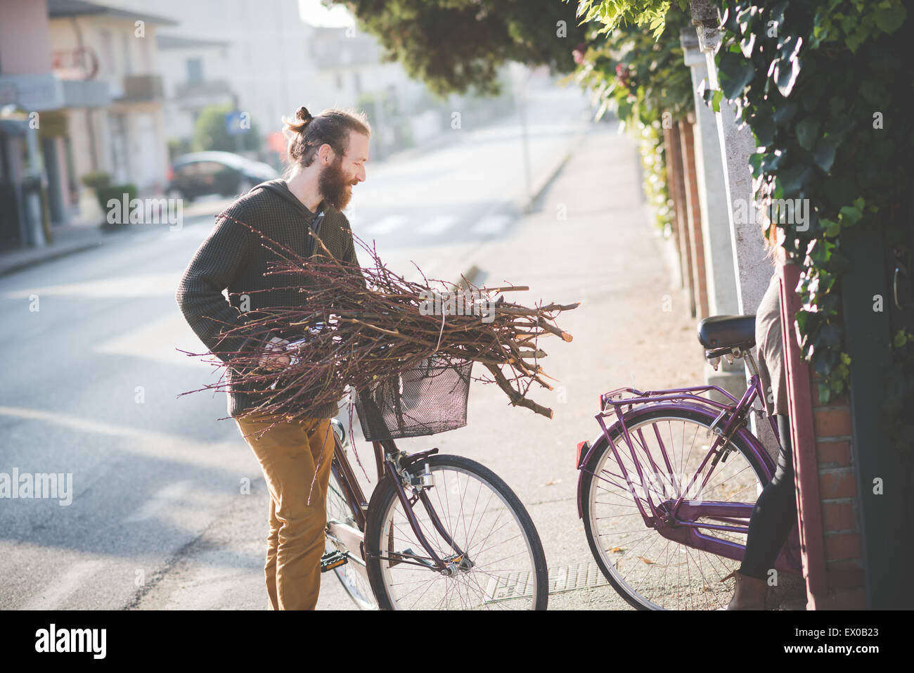 Man carrying sticks hi-res stock photography and images - Alamy