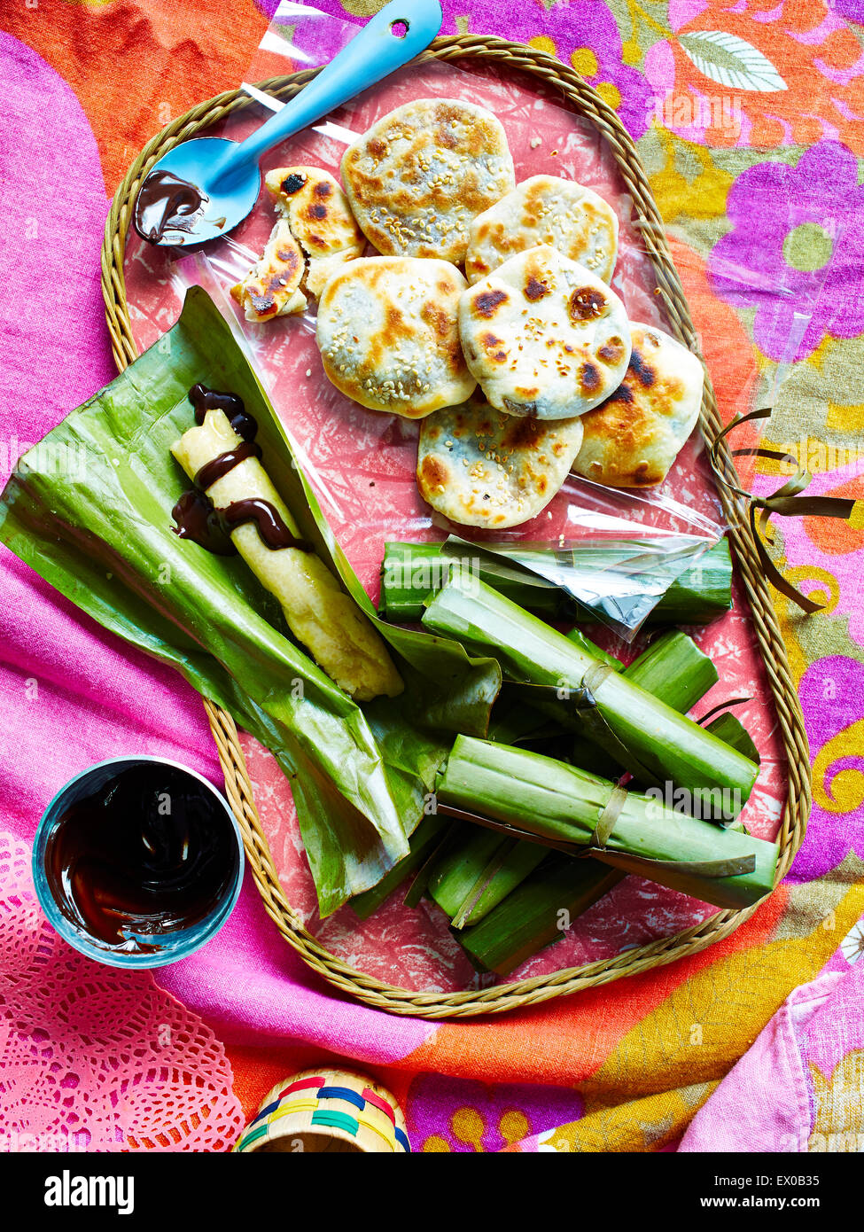 Still life with tray of Filipino budbud kabog and piaya (pasalubong ...