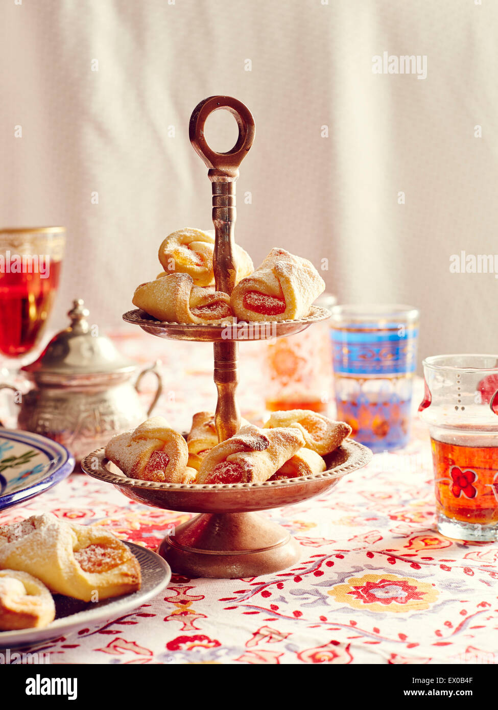 Still life of turkish delight cookies on cake stand Stock Photo - Alamy