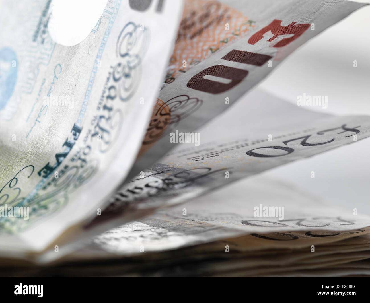 Close up detail of a stack of British banknotes Stock Photo - Alamy