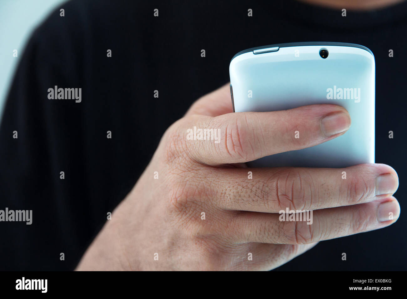 man checking his phone Stock Photo - Alamy