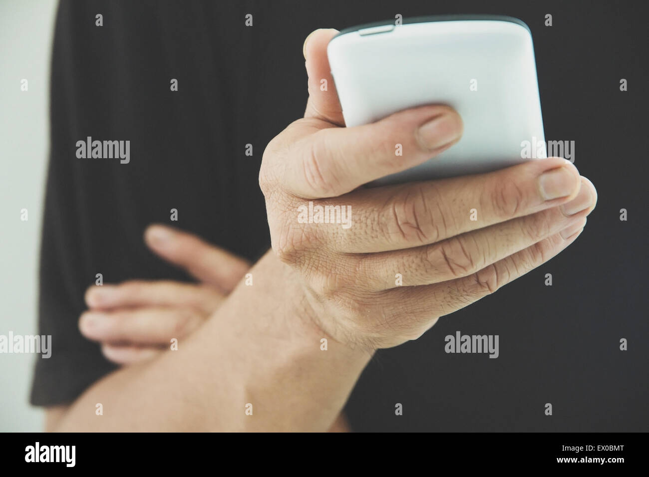 man checking his phone Stock Photo - Alamy