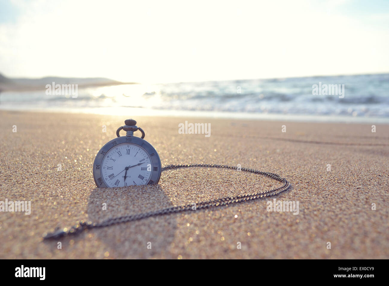 Time at beach hi-res stock photography and images - Alamy