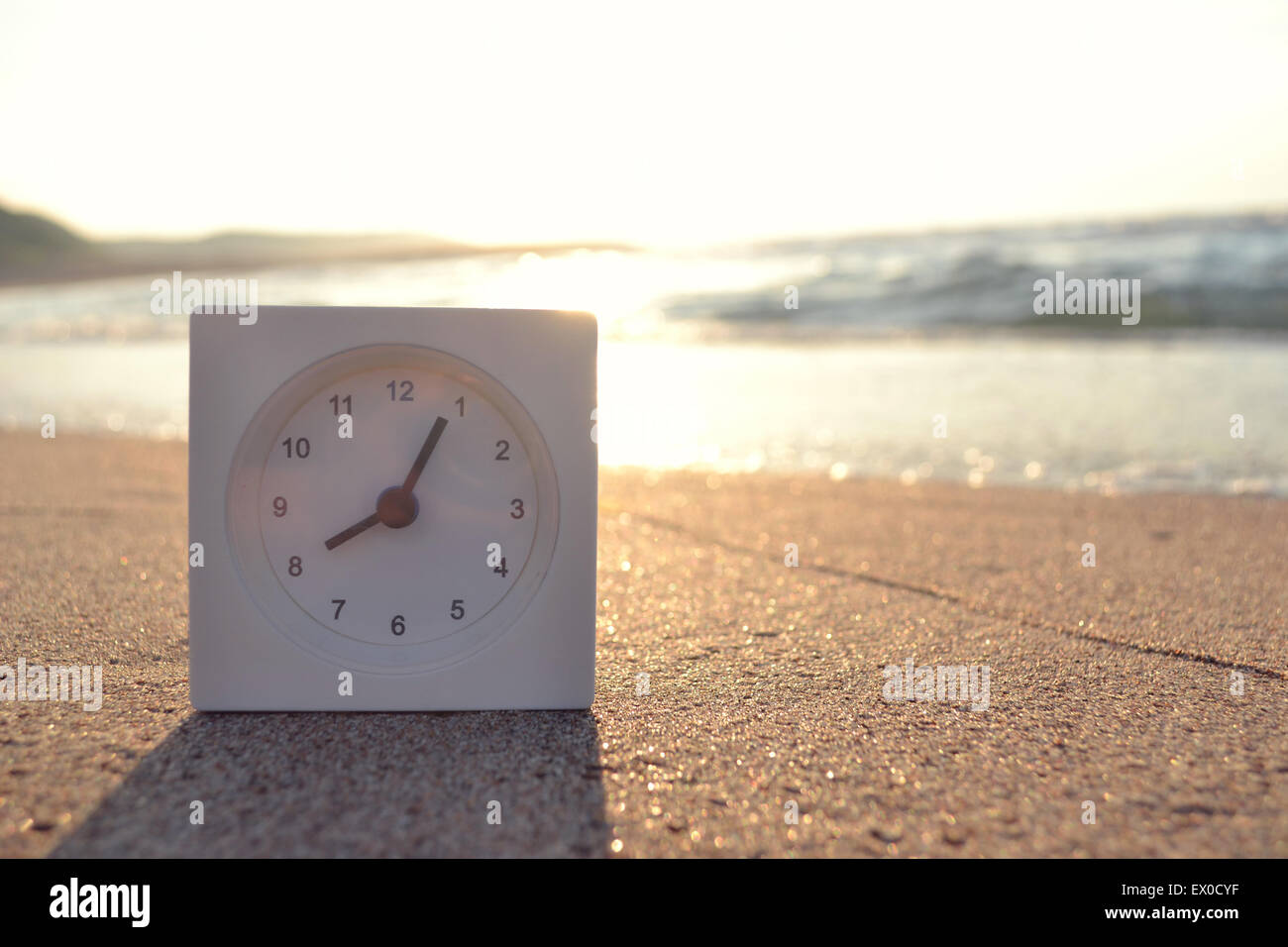 Time at beach hi-res stock photography and images - Alamy