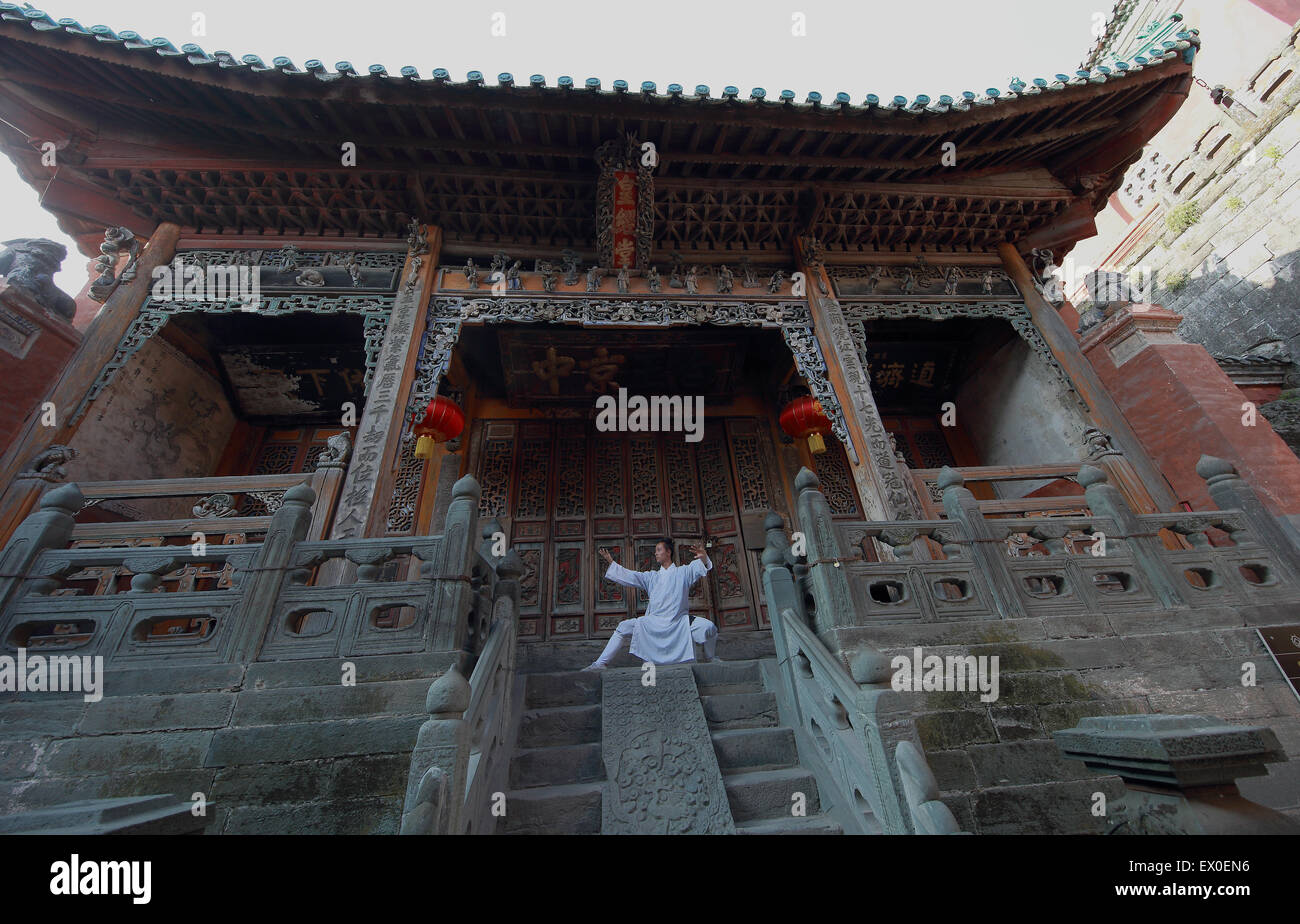 Taoist monk practicing Wudang martial arts at Wudang Mountains, China ...