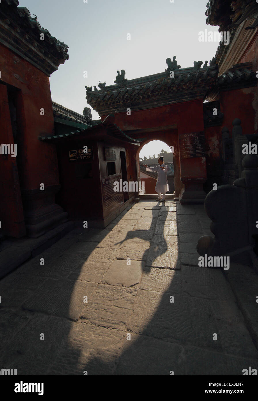 Taoist monk practicing Wudang martial arts at Wudang Mountains, China ...
