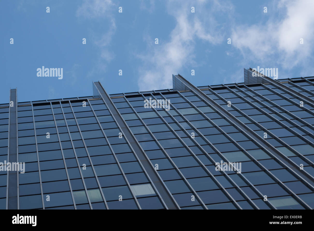 lookup office building blue sky Stock Photo - Alamy