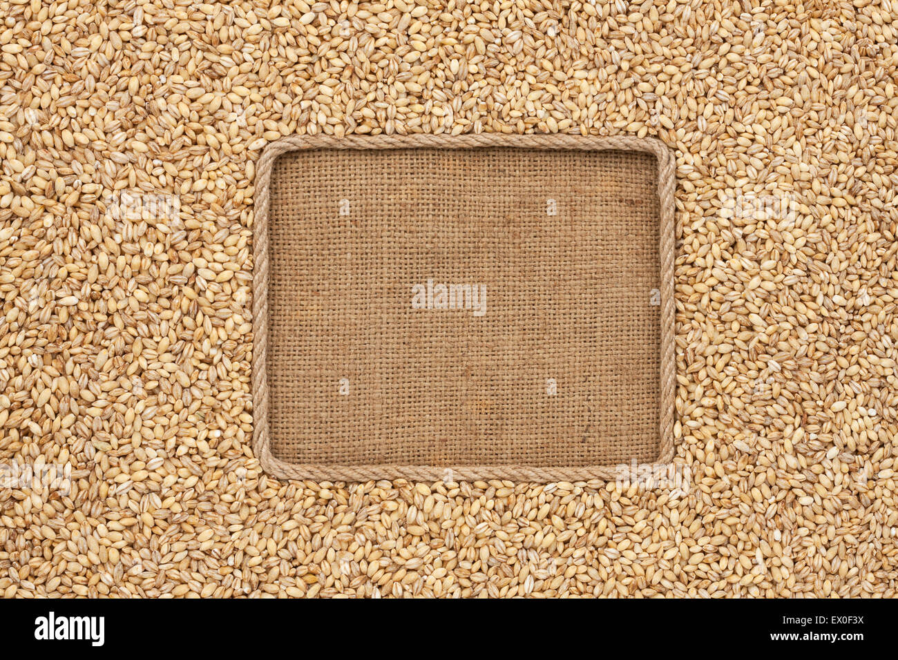 Frame made of rope with pearl barley on sackcloth, with place for your ...