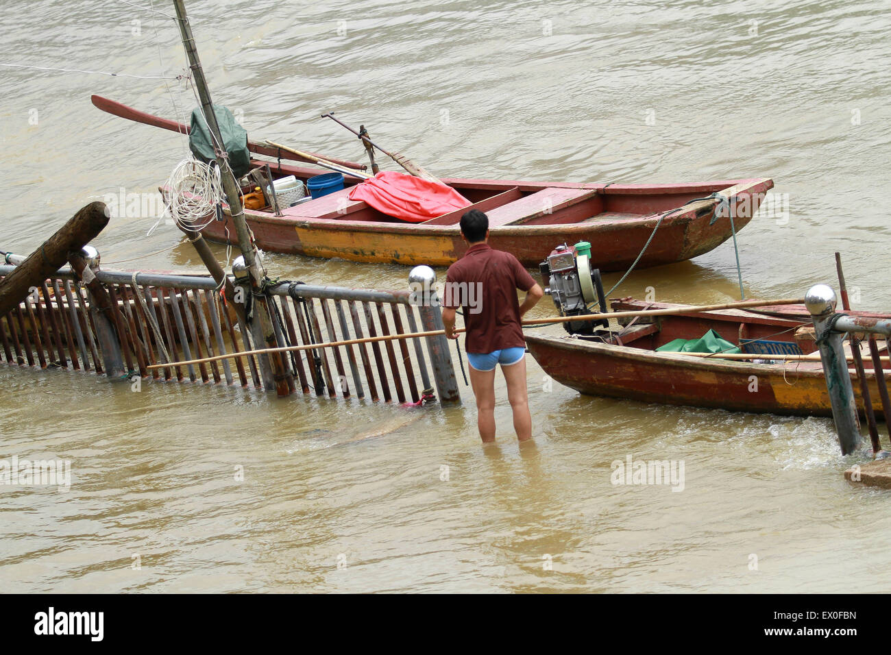 Nanping, China's Fujian Province. 3rd July, 2015. Fishermen transfer ...