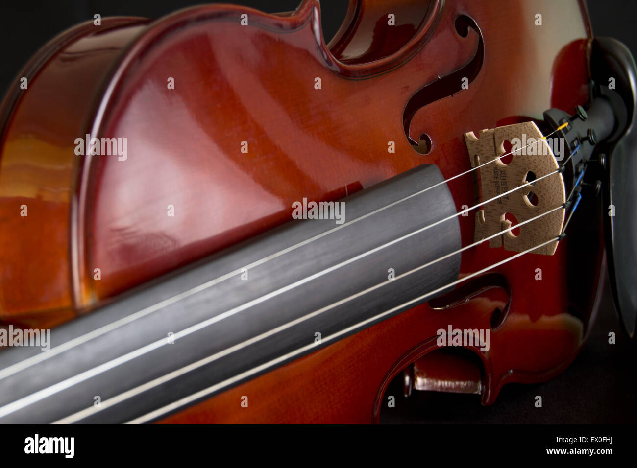 Violin close up with black background Stock Photo - Alamy
