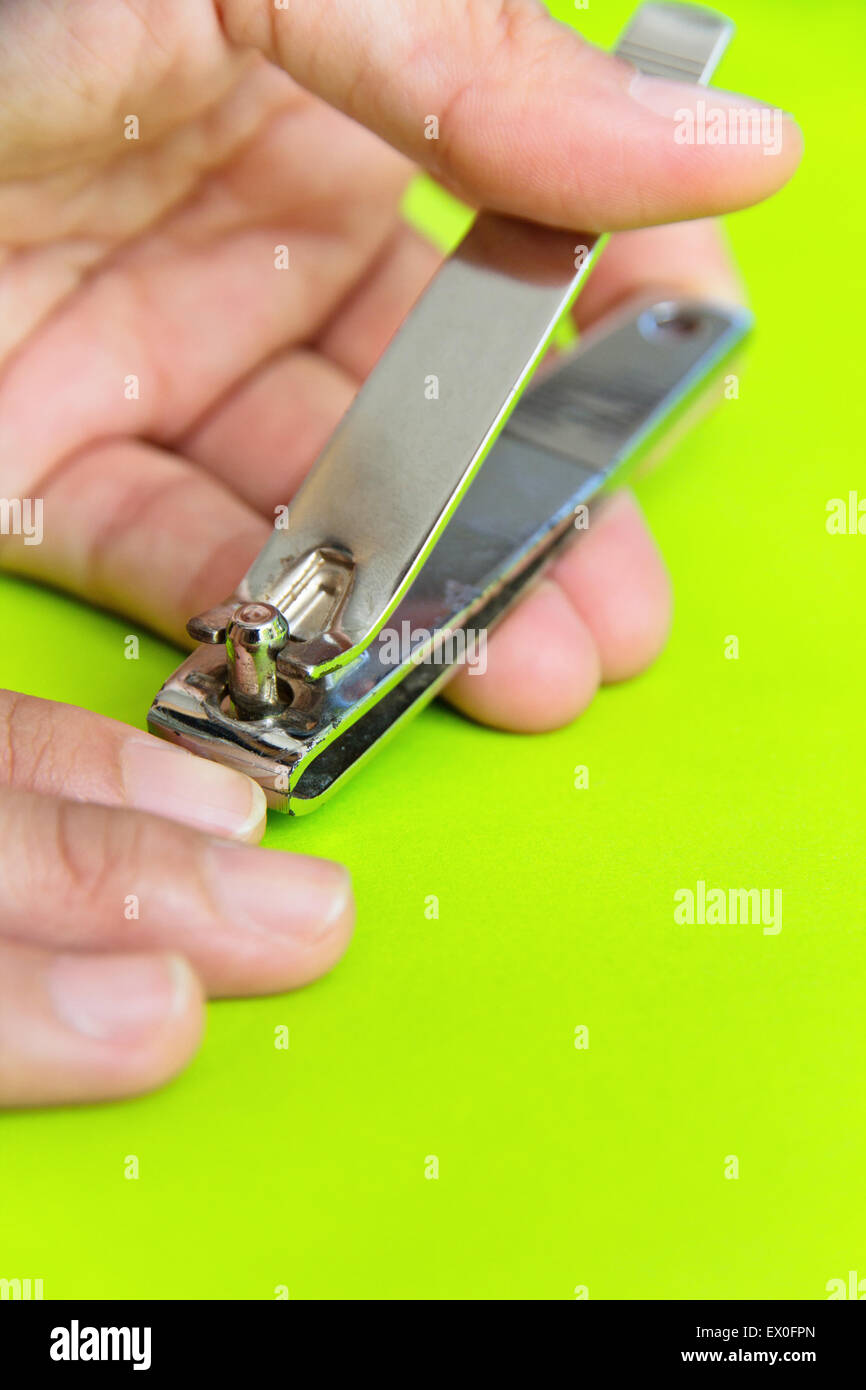 Cutting your fingernails Stock Photo - Alamy