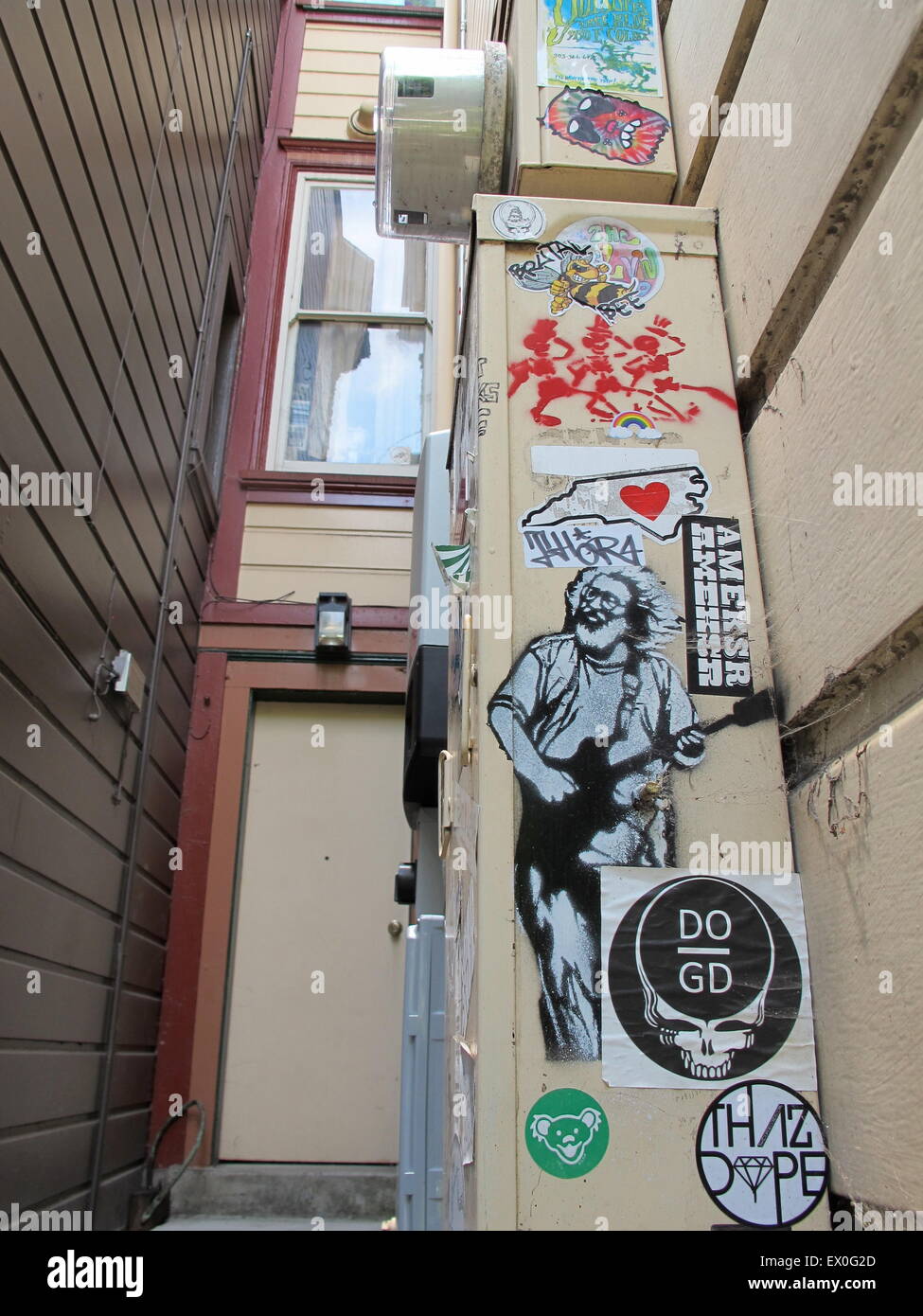 An electrical box covered with stickers reminds one of the fact that ...