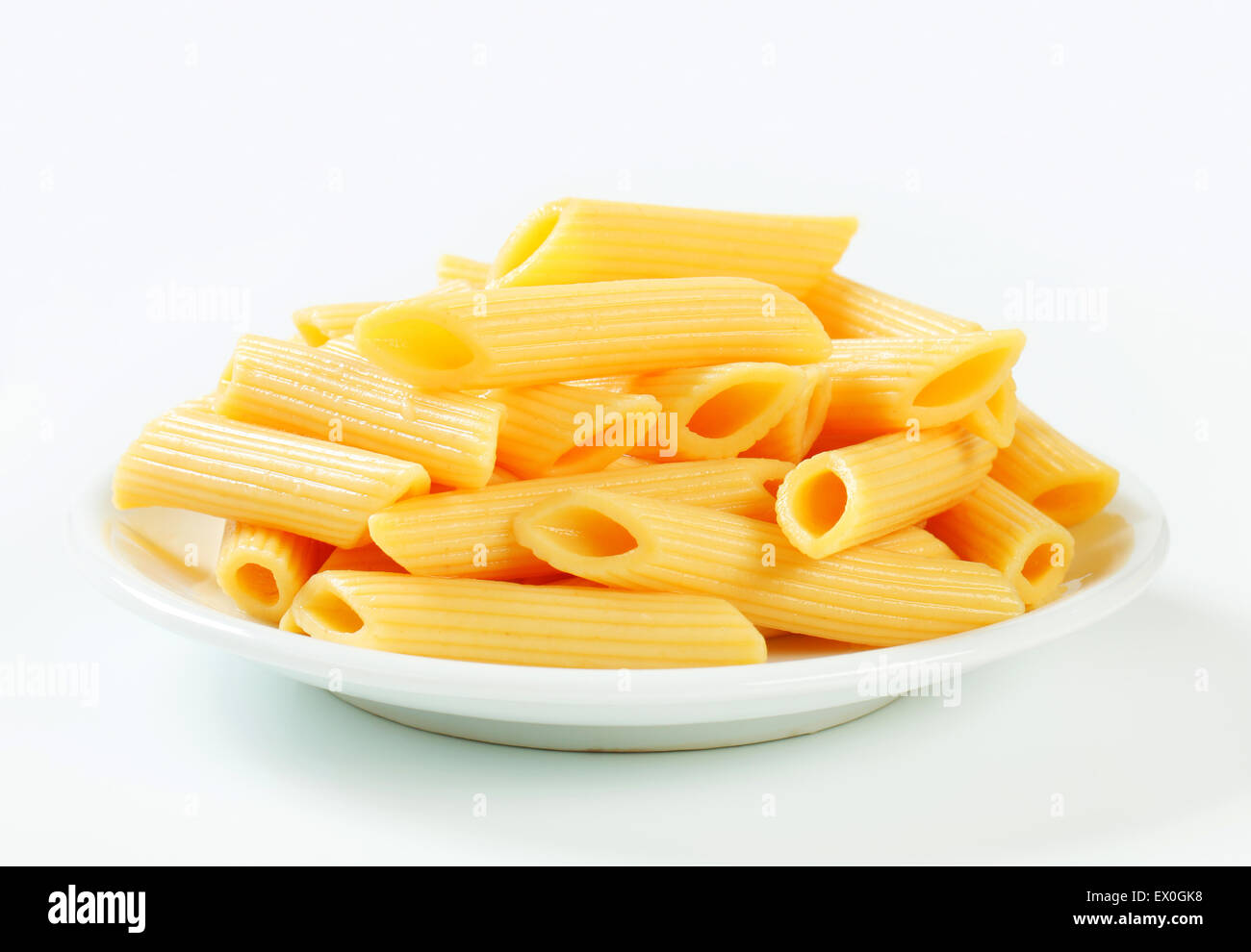 Portion of cooked penne pasta Stock Photo - Alamy