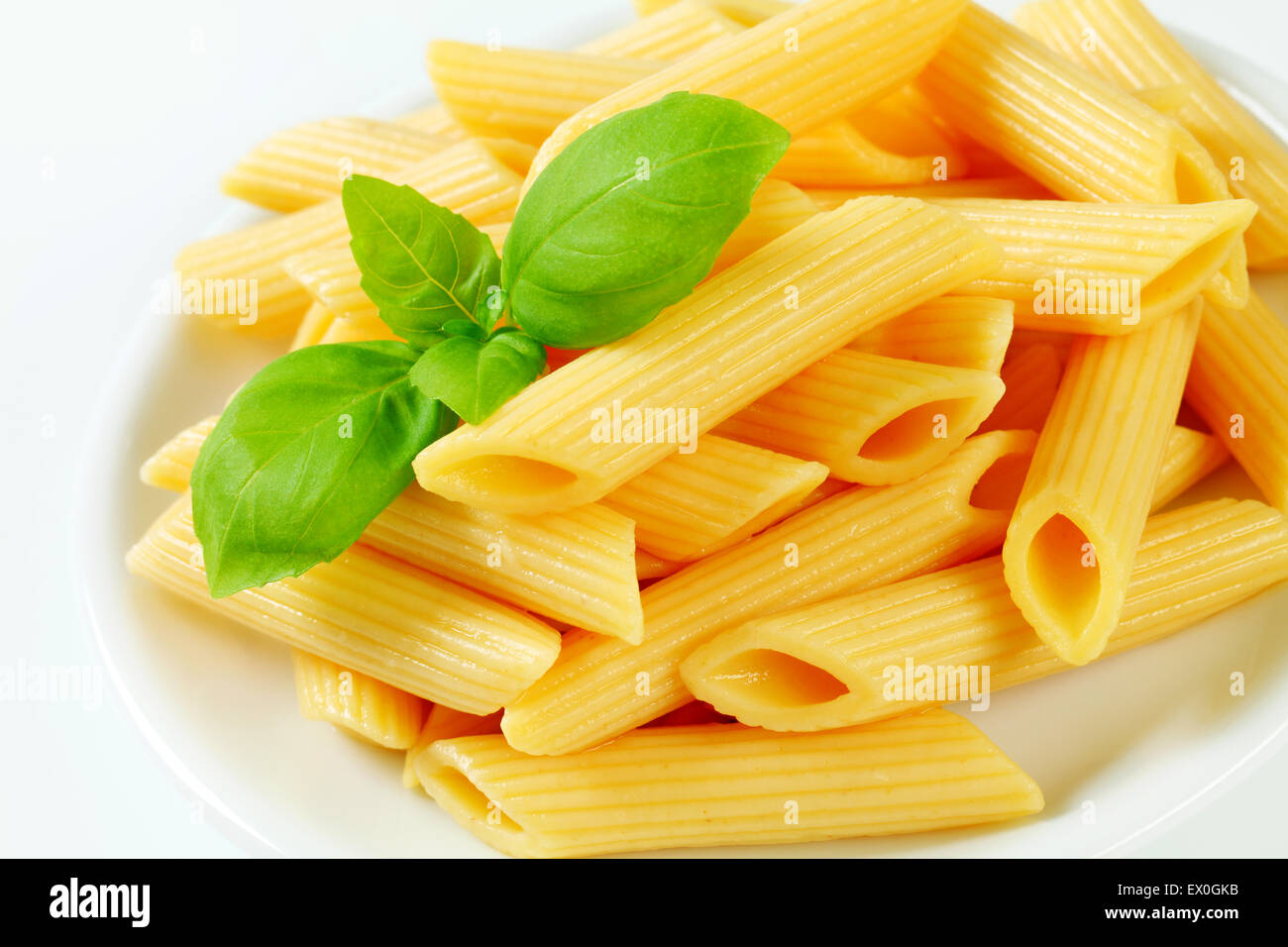 Portion of cooked penne pasta Stock Photo - Alamy