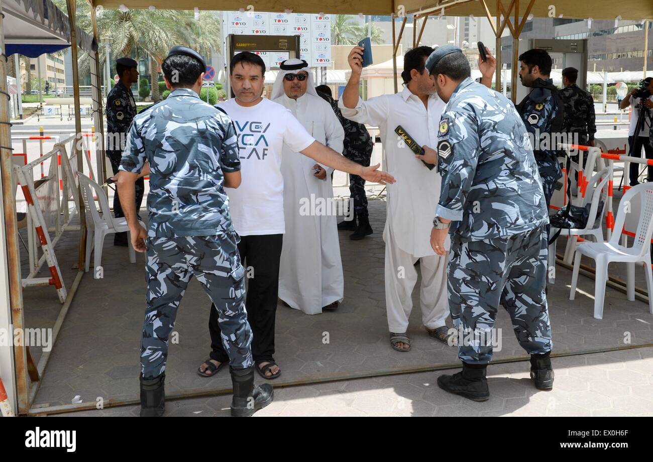 Kuwait City, Kuwait. 03rd July, 2015. Security guards check Muslims who ...