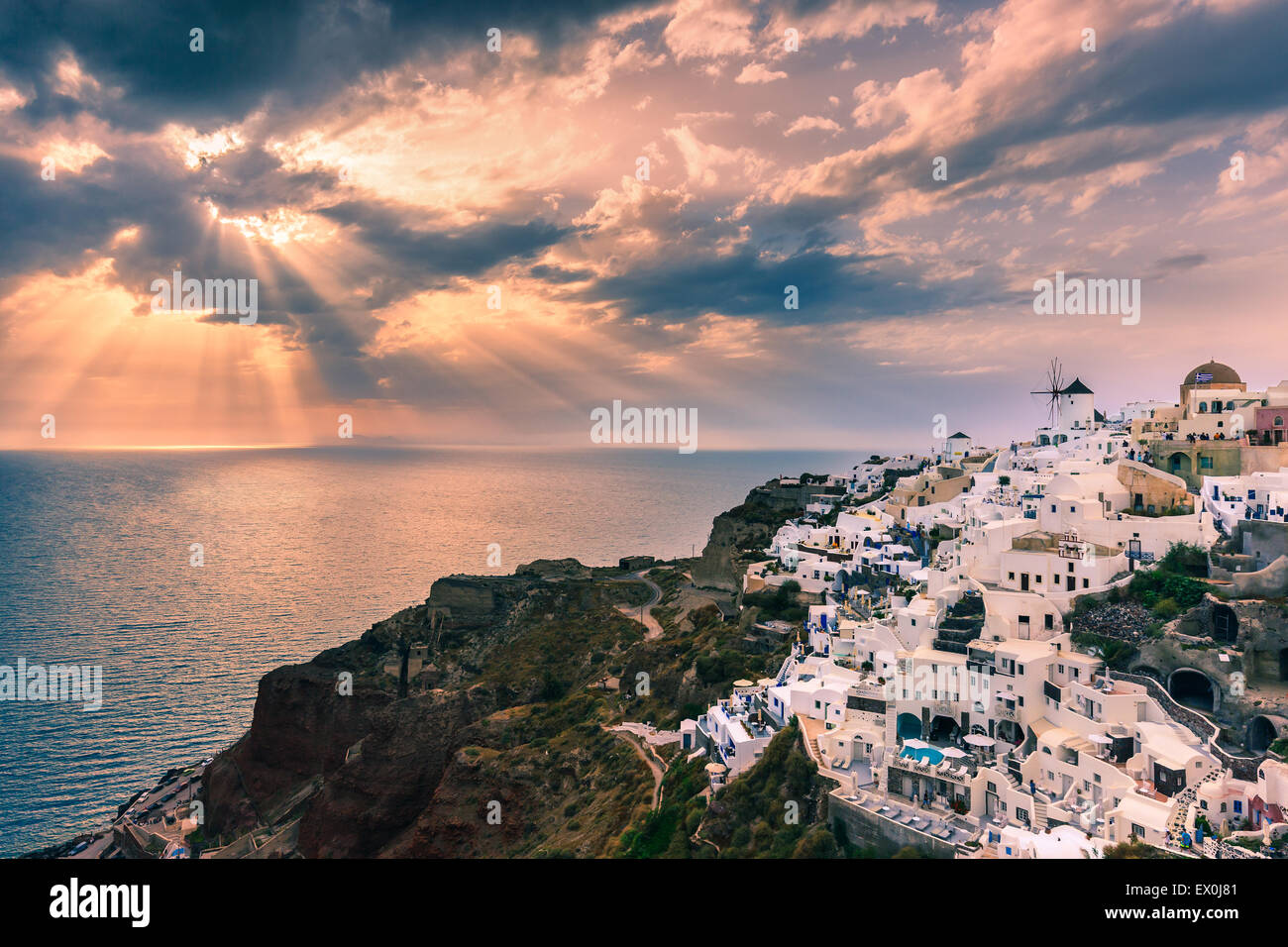 The town of Oia during sunset on Santorini, one of the Cyclades islands ...