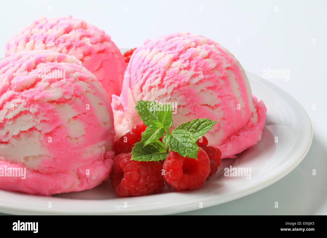 Scoops of raspberry yogurt ice cream Stock Photo - Alamy