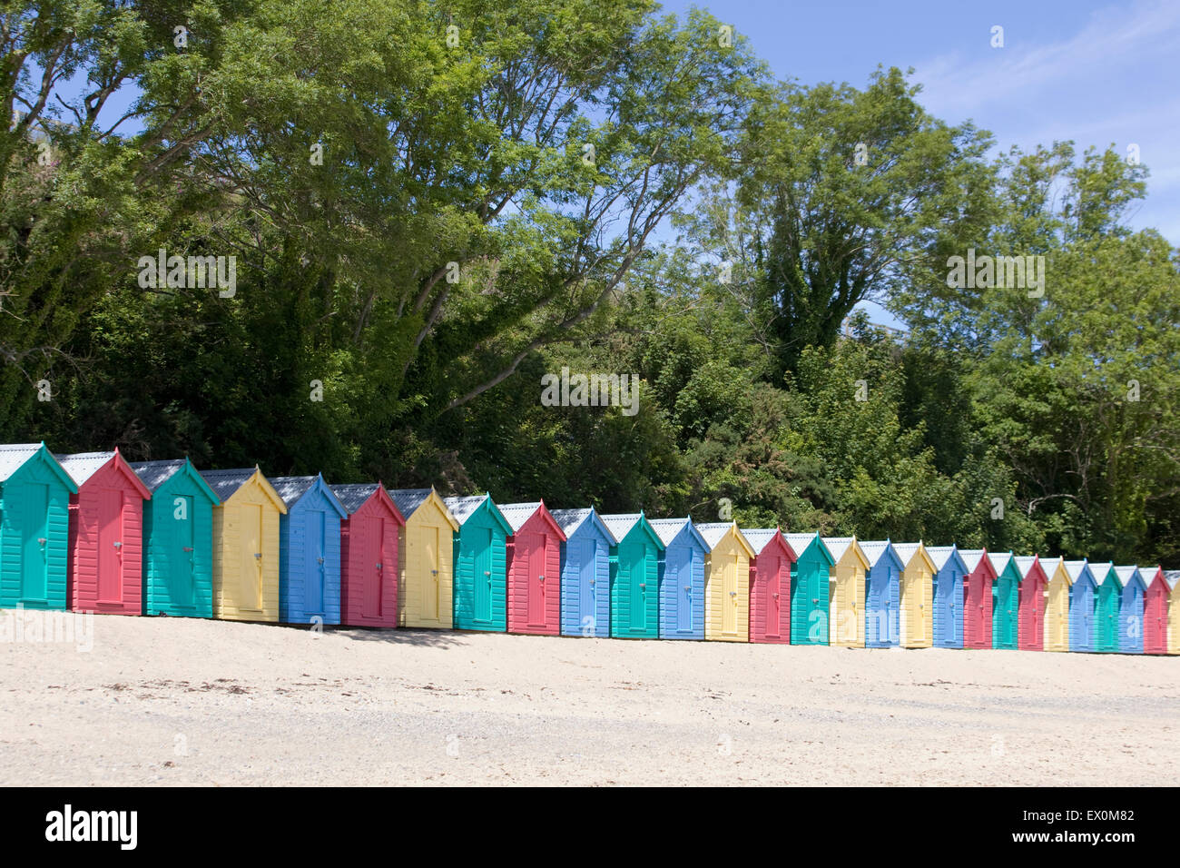 Colourful beach huts at a traditional British Beach Stock Photo - Alamy