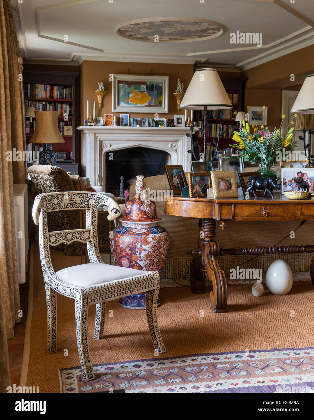 Elegant 1830's elm library table displaying lamps by William Yeoward in ...