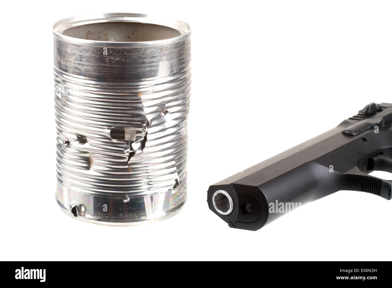 Target practice Tin can full of holes with a gun isolated on white ...
