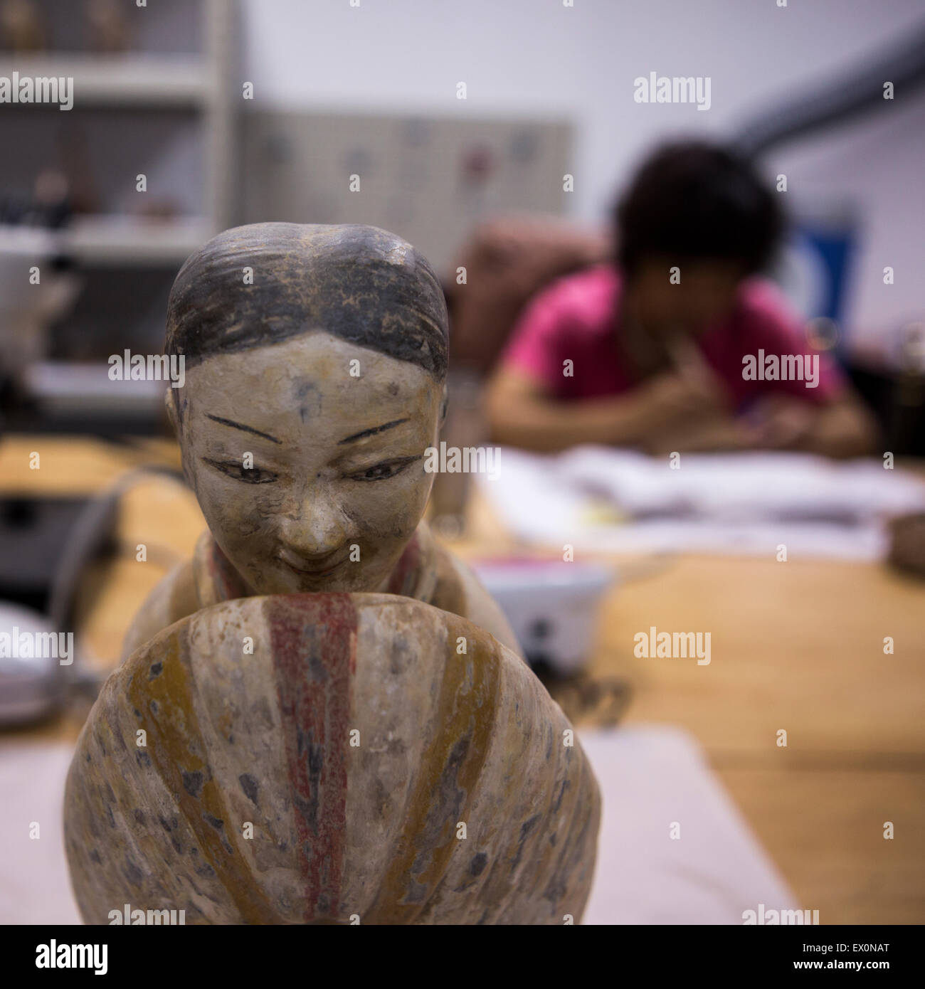 Clay figure in the restoration laboratory at the Han Yang Ling Tomb in ...