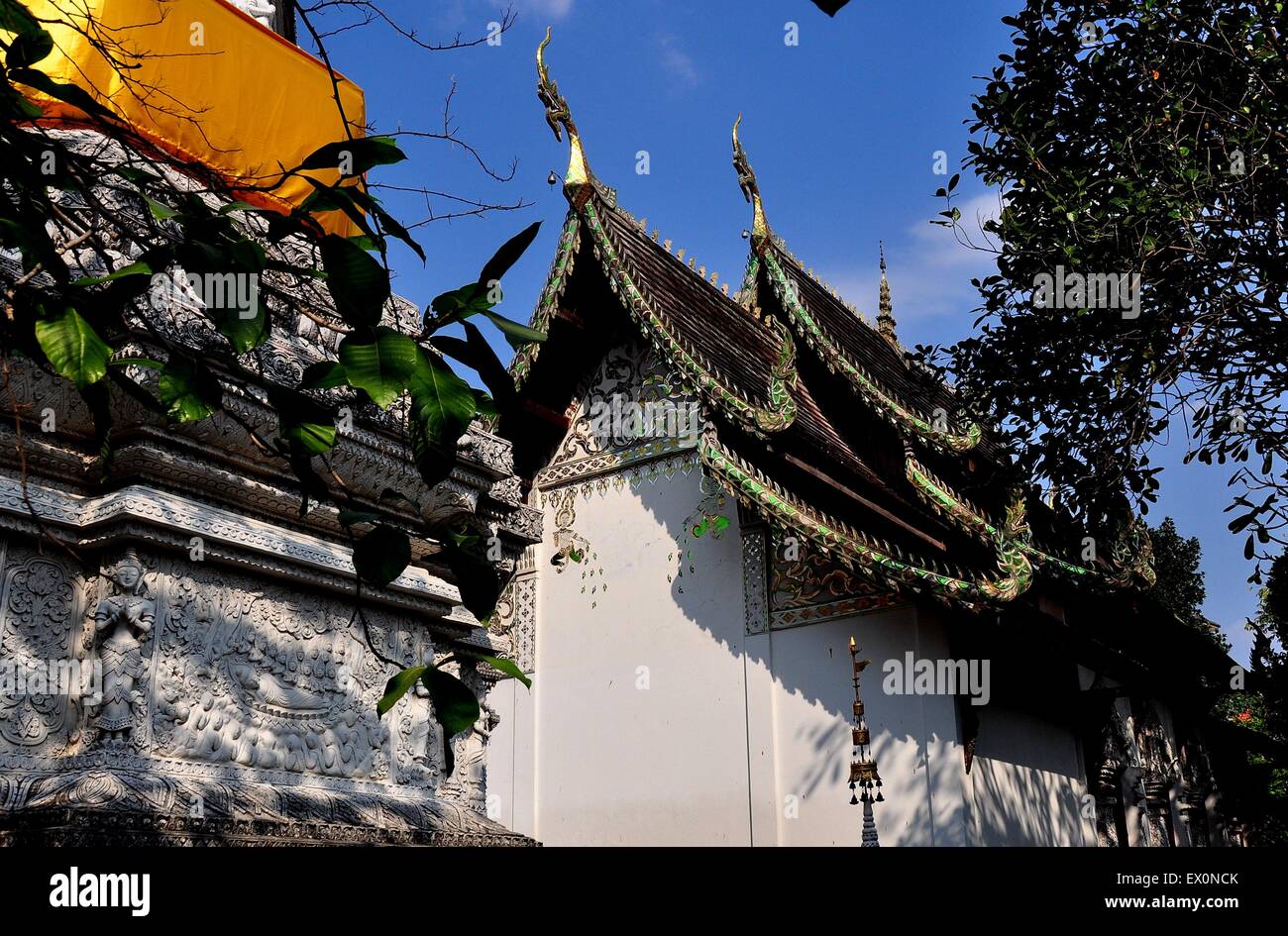 Chiang Mai, Thailand: Vihan hall with steep roofs lined by green dragon ...