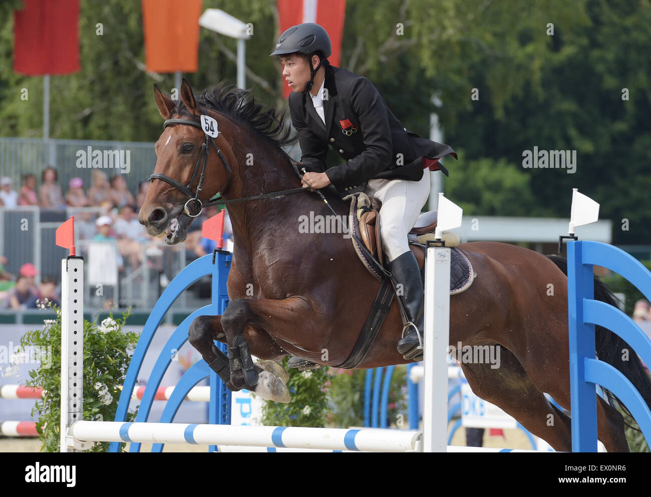 Berlin, Germany. 3rd July, 2015. Chinese Starter Jiahao Han riding in ...
