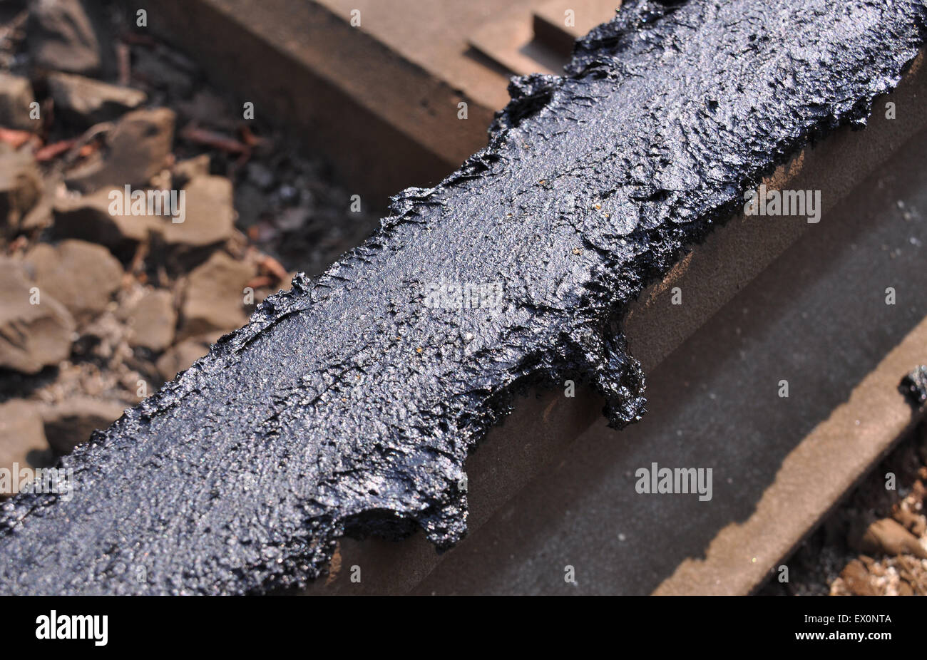 Gelsenkirchen, Germany. 3rd July, 2015. Bitumen which has melted in ...