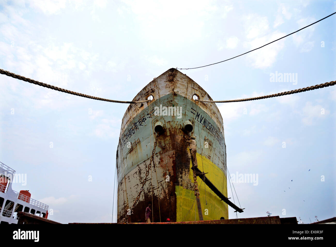 Shipyard workers near the Buriganga River in Dhaka. About 15,000 people ...