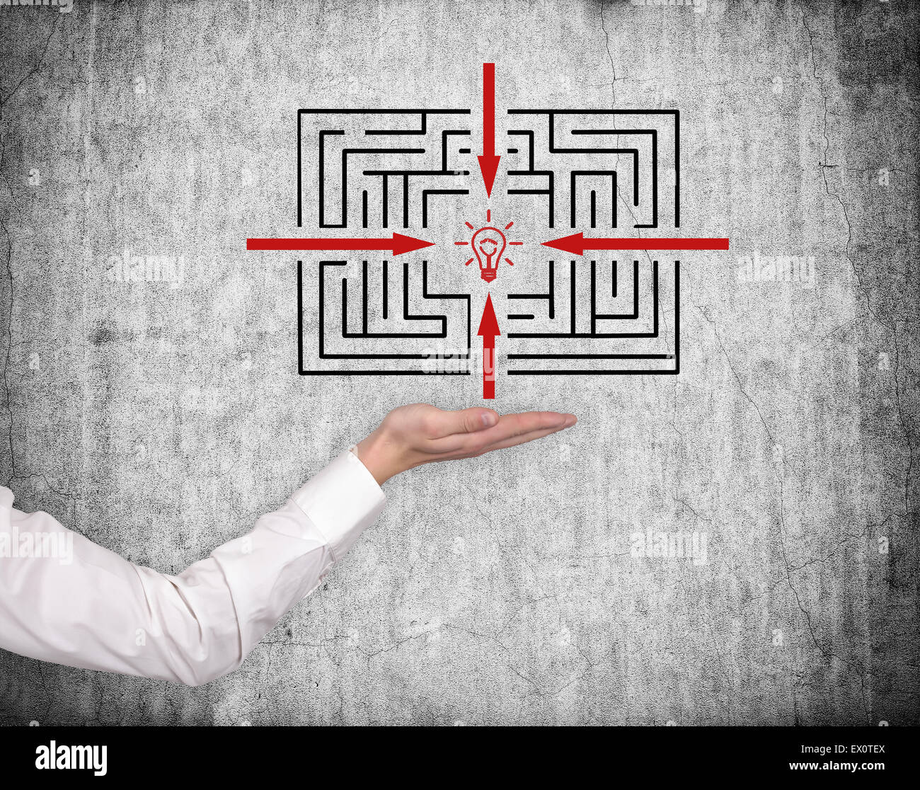 hand holding labyrinth on gray wall background Stock Photo - Alamy