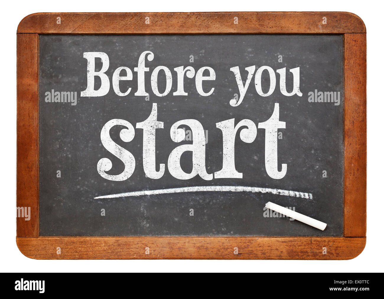 Before your start sign - white chalk text on a vintage slate blackboard ...