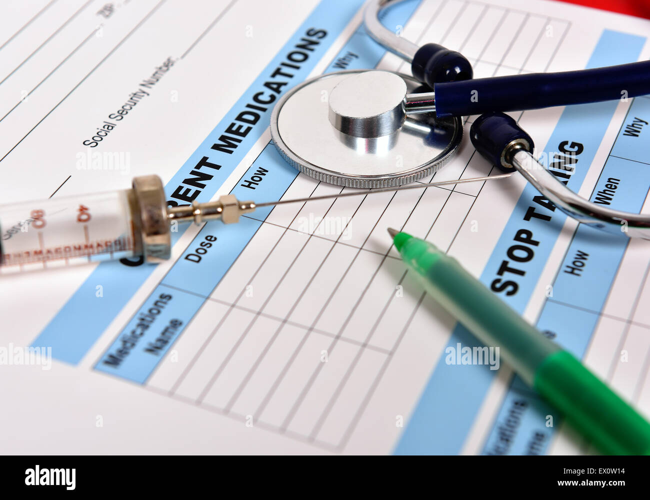 syringe, stethoscope and Medical form. close up Stock Photo - Alamy